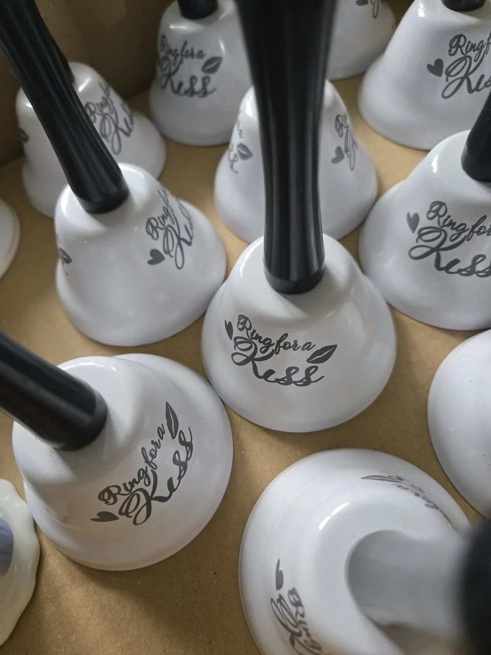Party Supplies | Ring For A Kiss White Ceramic Hand Bells With Black ...